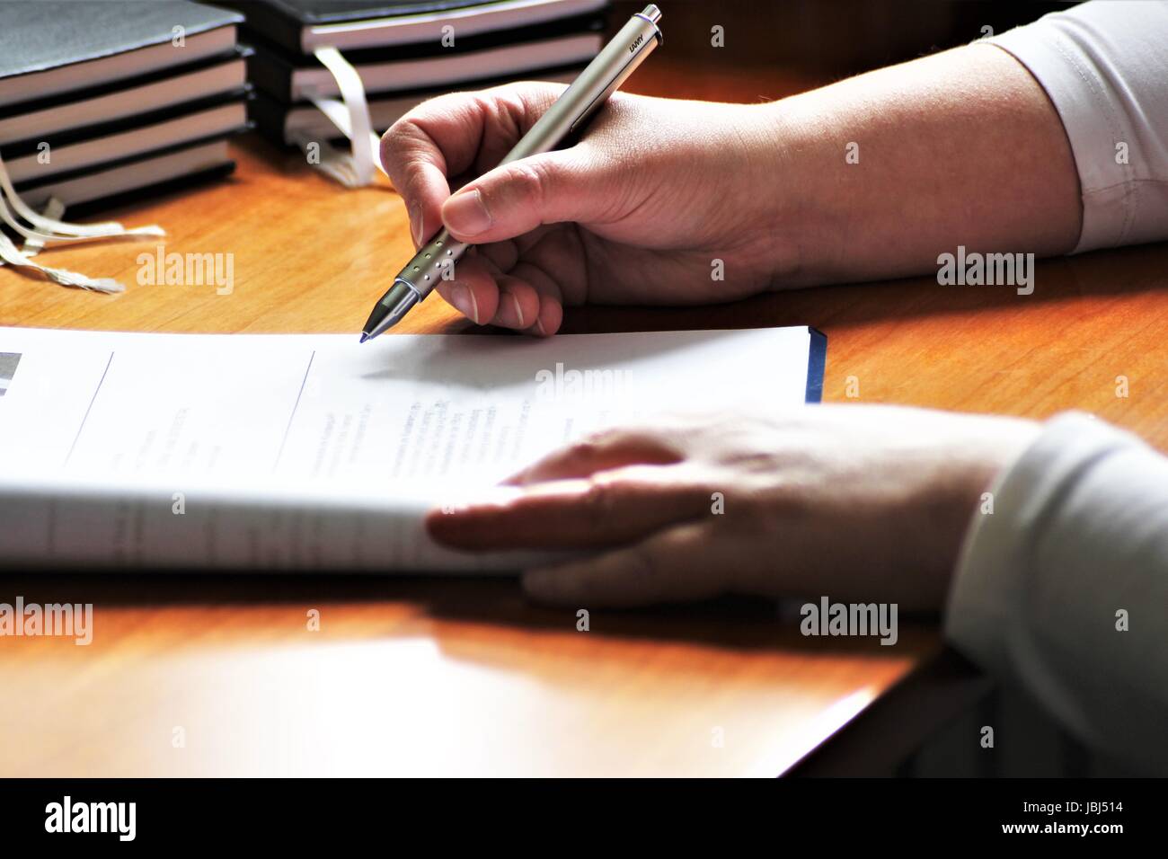 An Image of a Hand with pen - writing Stock Photo - Alamy
