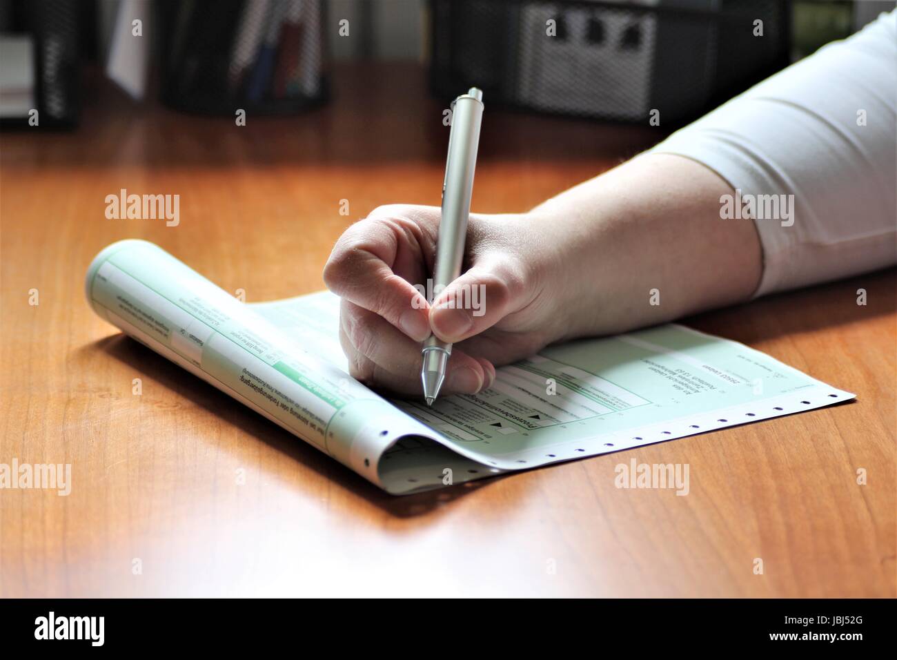 An Image of a Hand with pen - writing Stock Photo - Alamy