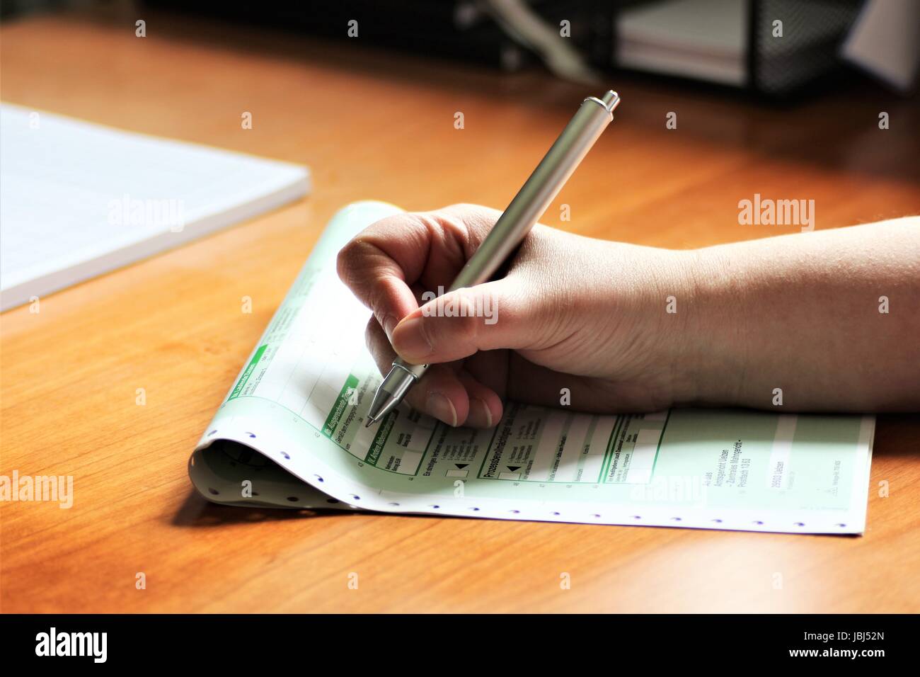 An Image of a Hand with pen - writing Stock Photo - Alamy