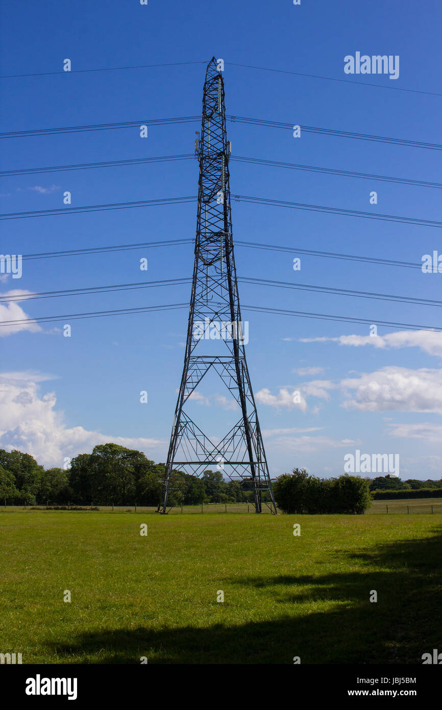 Electricity power cables and pylons stretching across the English ...