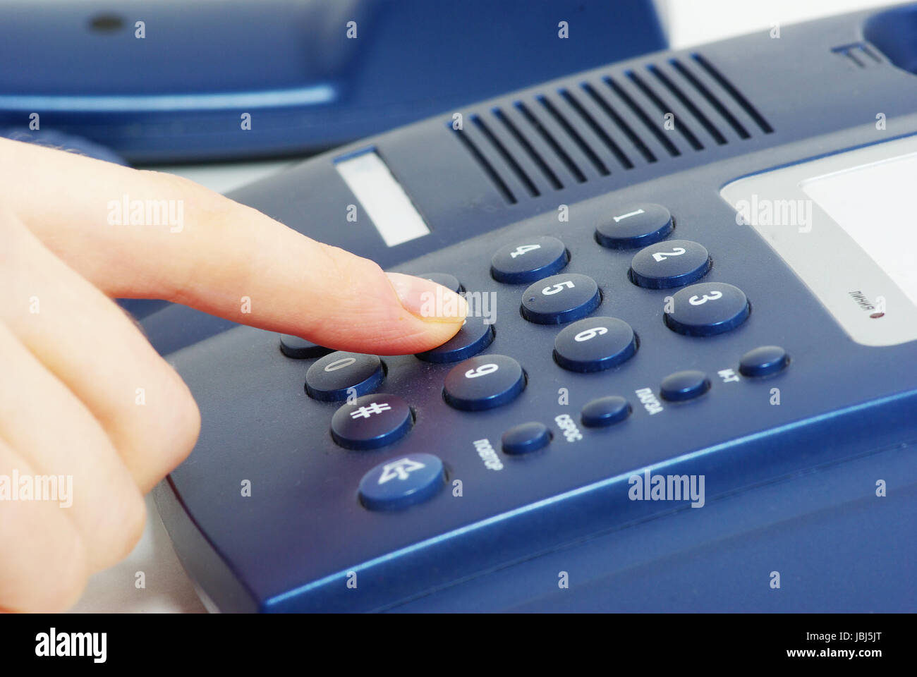 finger with blue telephone keypad Stock Photo - Alamy