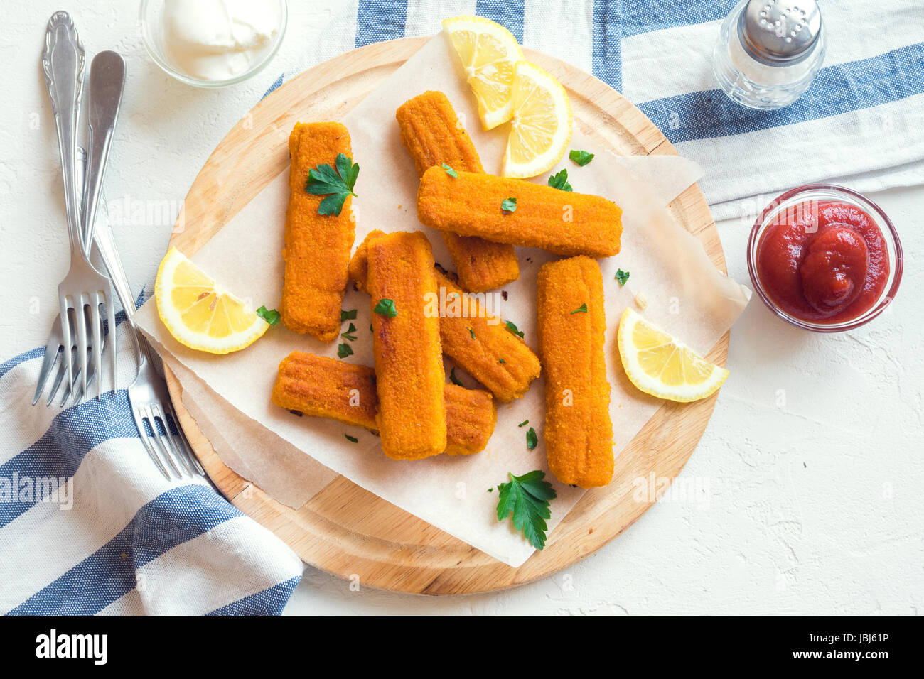 Fried Fish Sticks. Fish Fingers. Fish Sticks with lemon and sauces ...