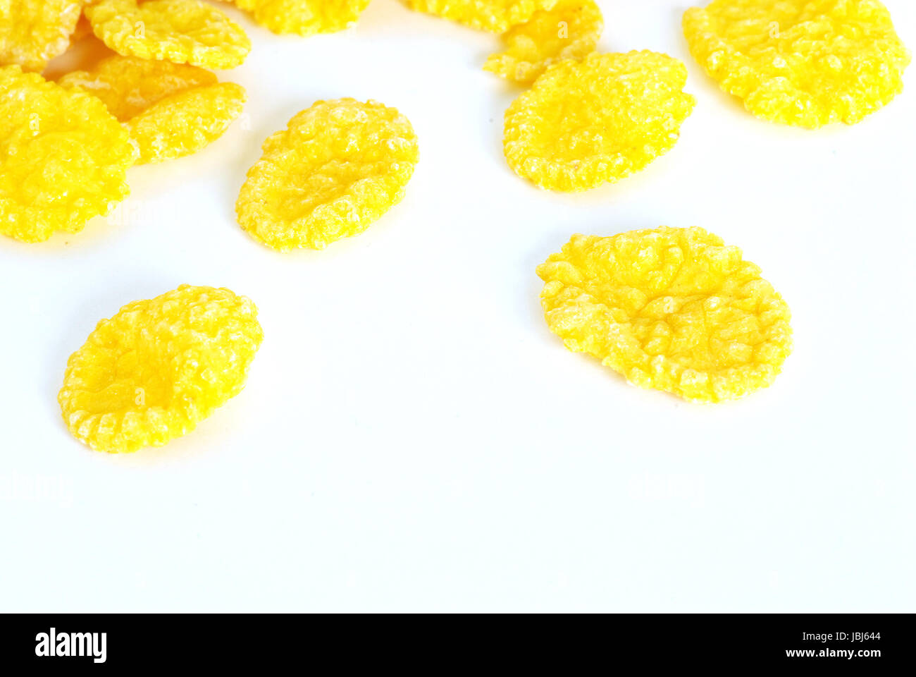 fresh corn flakes on white Stock Photo - Alamy