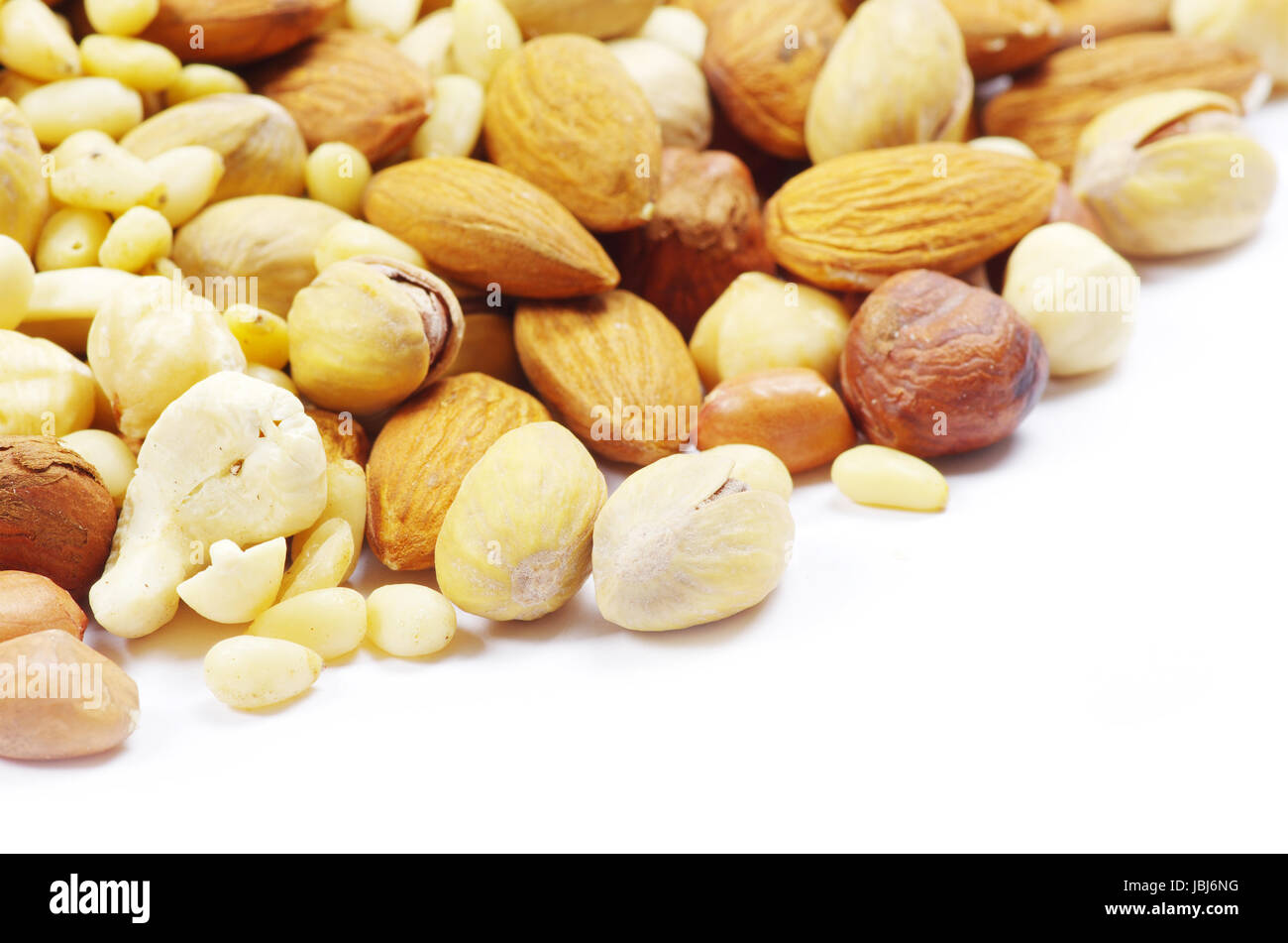 Assorted mixed nuts on white background Stock Photo - Alamy