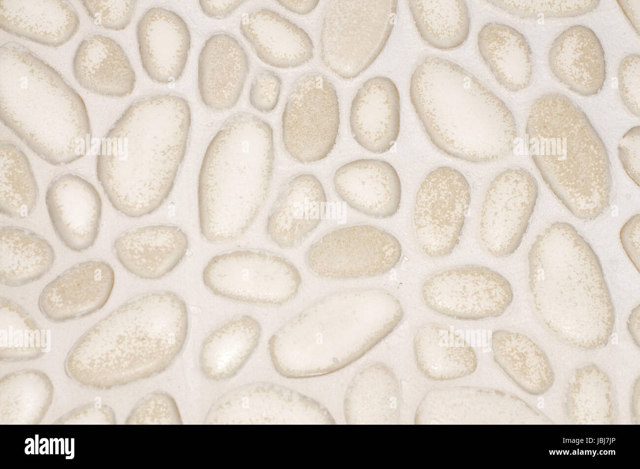 textured stone wall background with small stones and cement Stock Photo ...