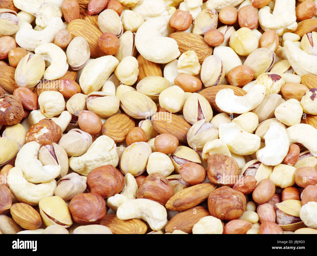 Nuts mixed for backgrounds or textures Stock Photo - Alamy