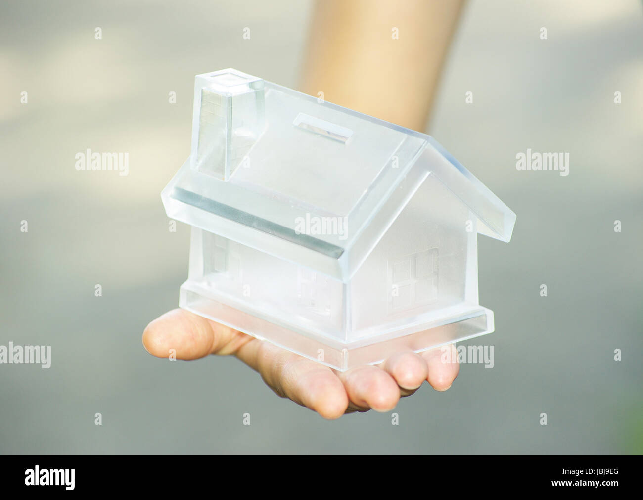 The house in human hand Stock Photo - Alamy