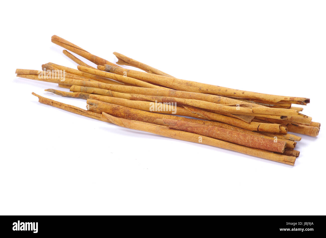 cinnamon bark on a white background Stock Photo - Alamy