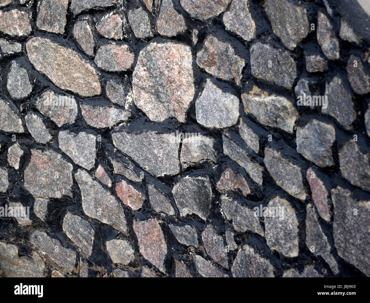Stone wall interesting shadows hi-res stock photography and images - Alamy