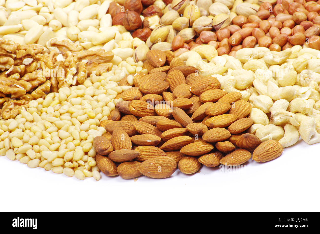 mixed nuts on white background Stock Photo - Alamy