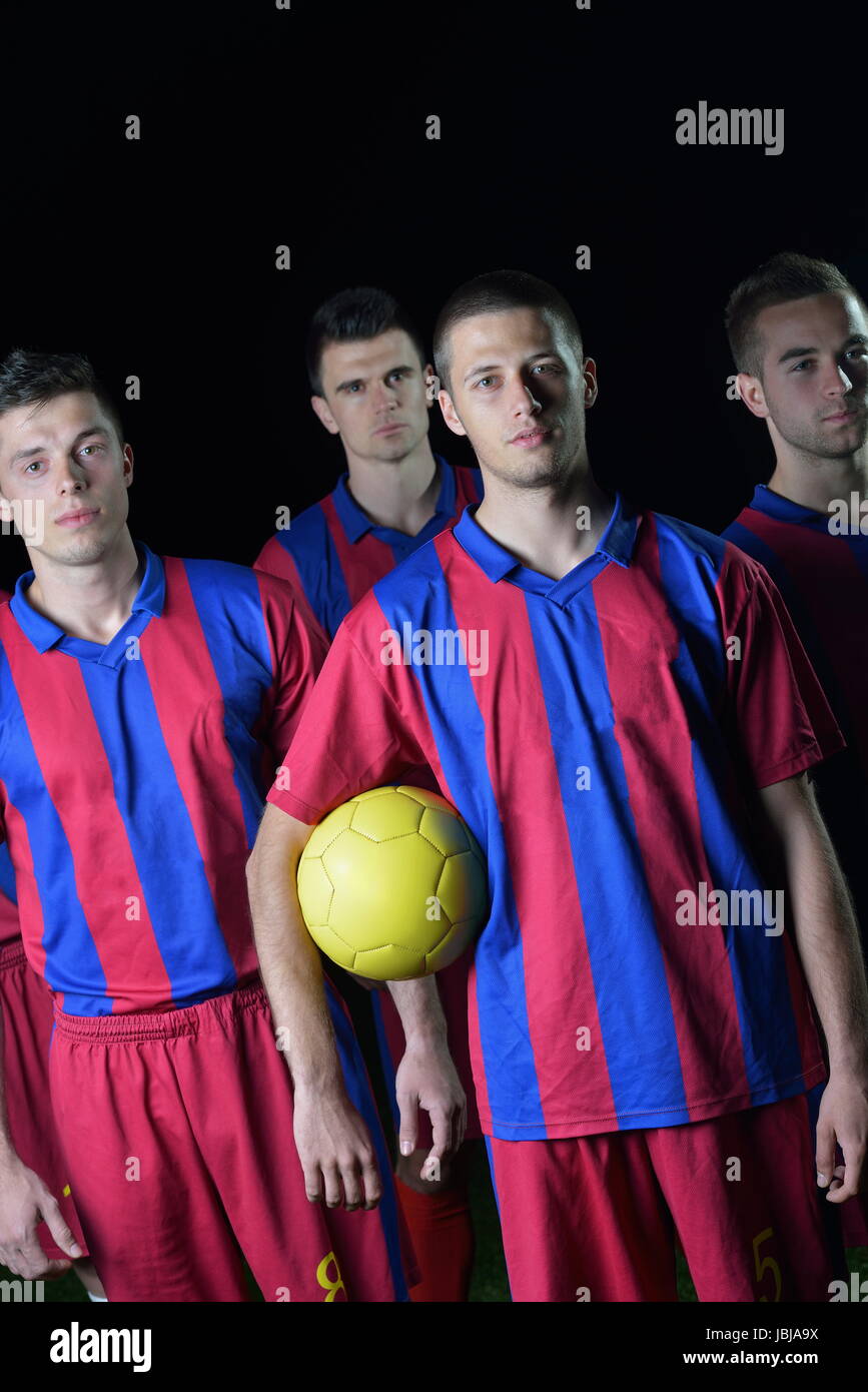 soccer players team group isolated on black background Stock Photo - Alamy