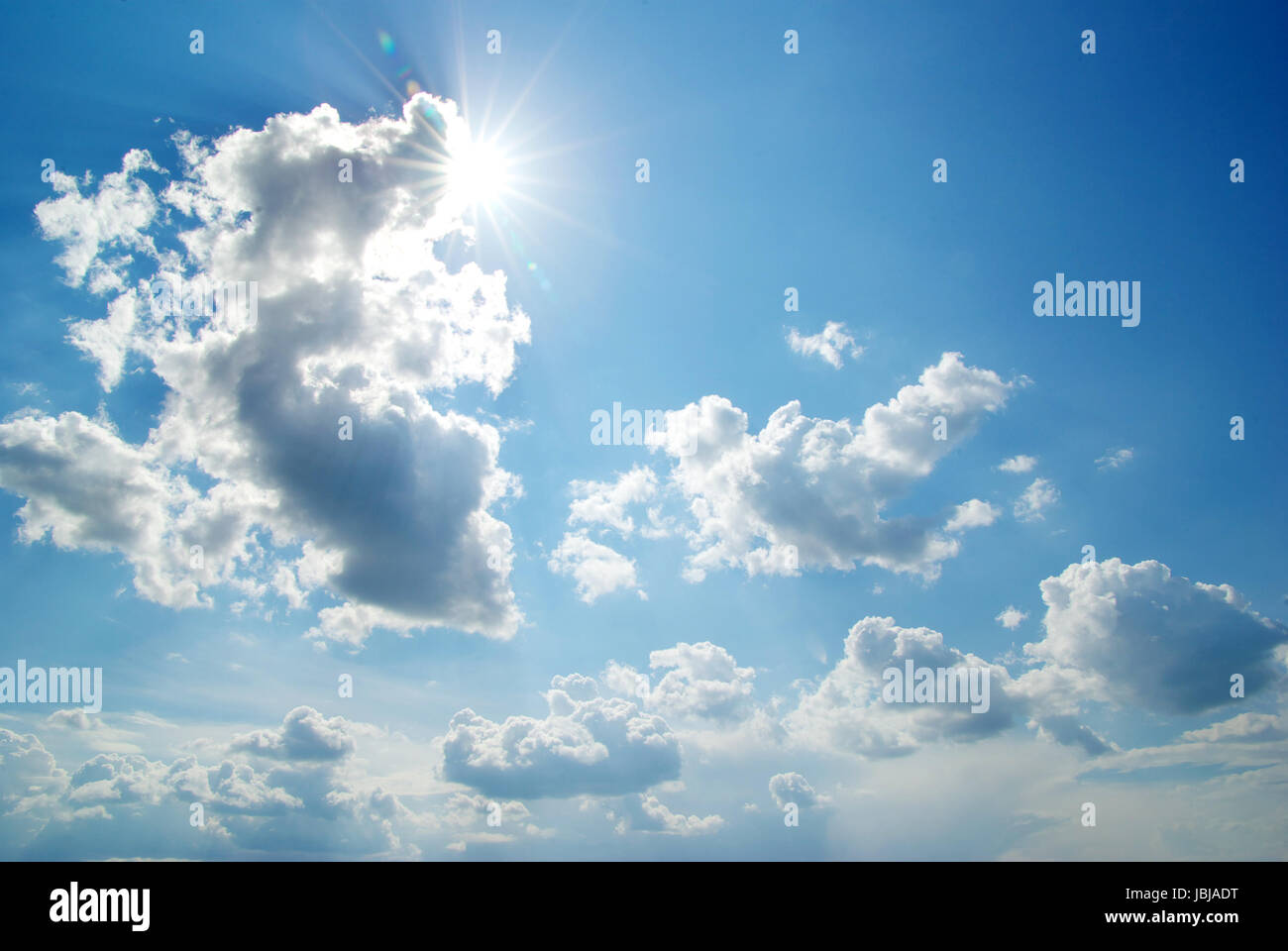 sunny sky background with a tiny clouds Stock Photo - Alamy