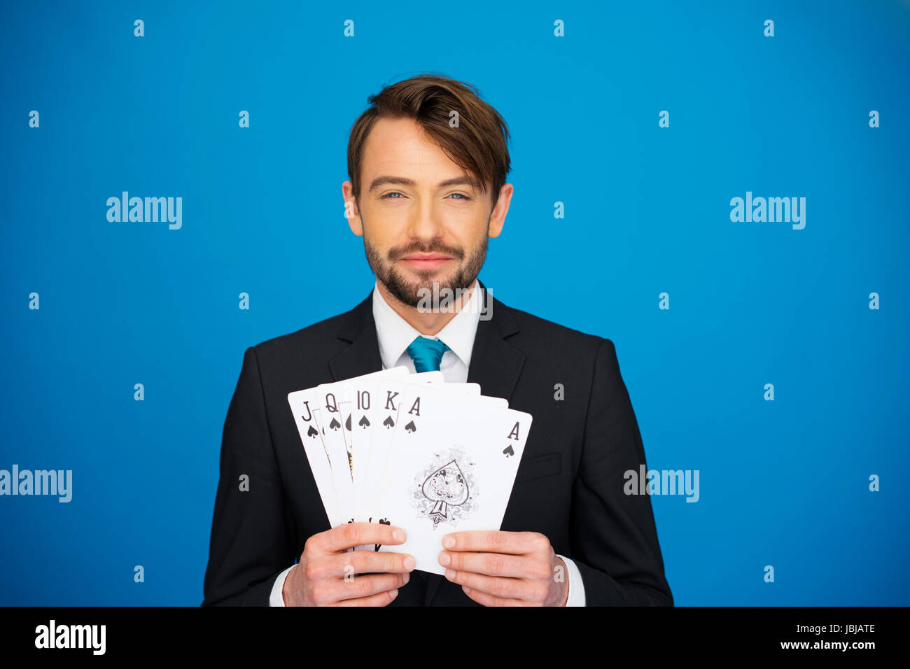 Businessman with pack of cards hi-res stock photography and images - Alamy