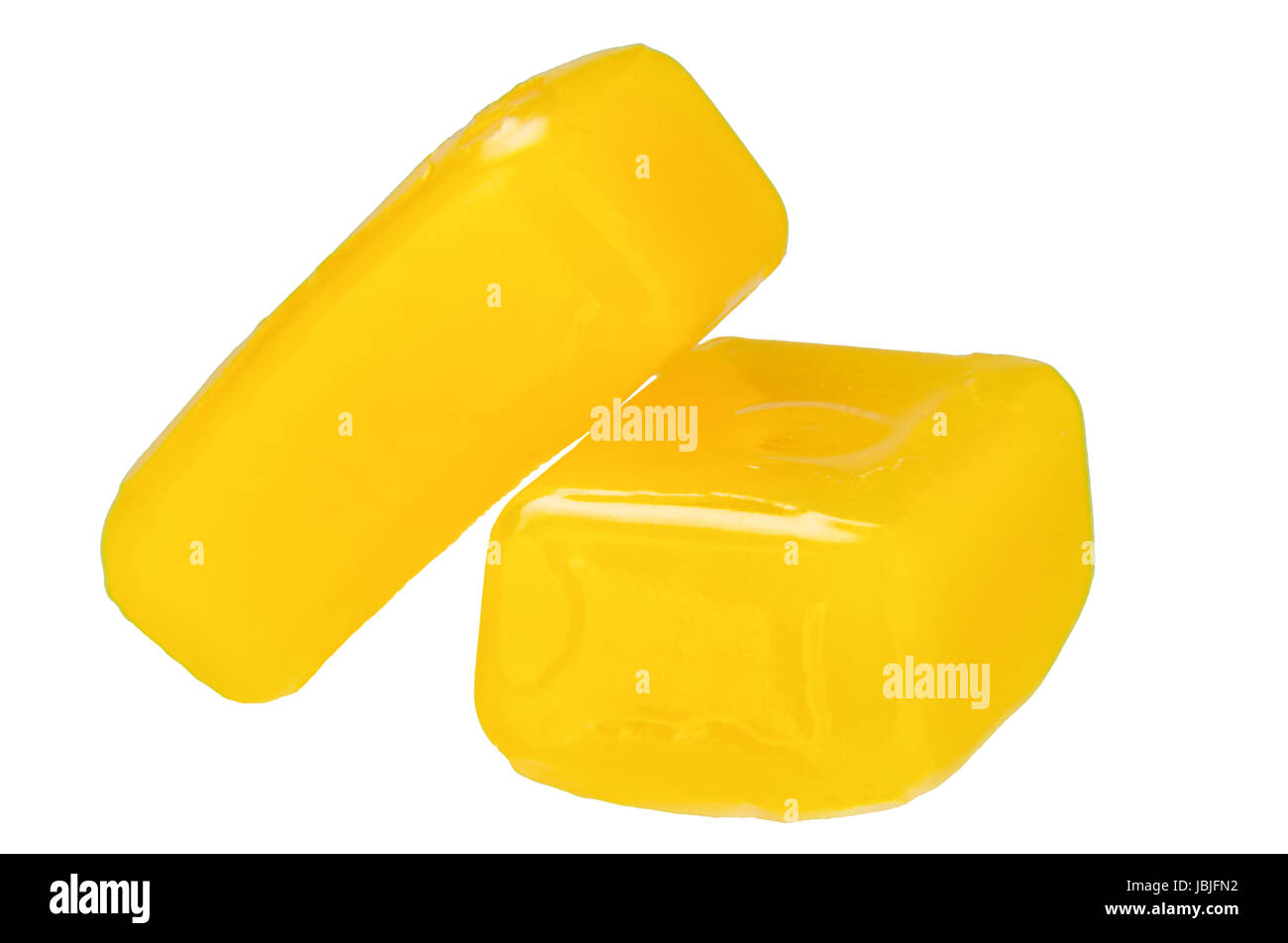 tangerine hard candy isolated on the white background Stock Photo - Alamy