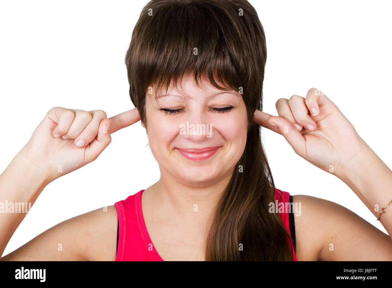 young beautiful woman covering her ears. isolated on white background ...