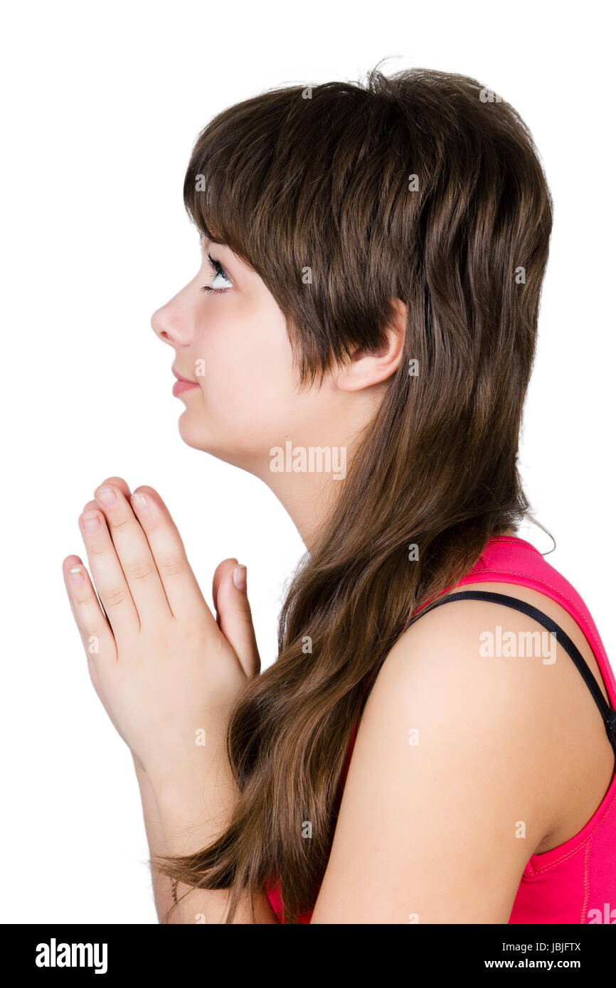 young beautiful girl praying. isolated on white background Stock Photo ...