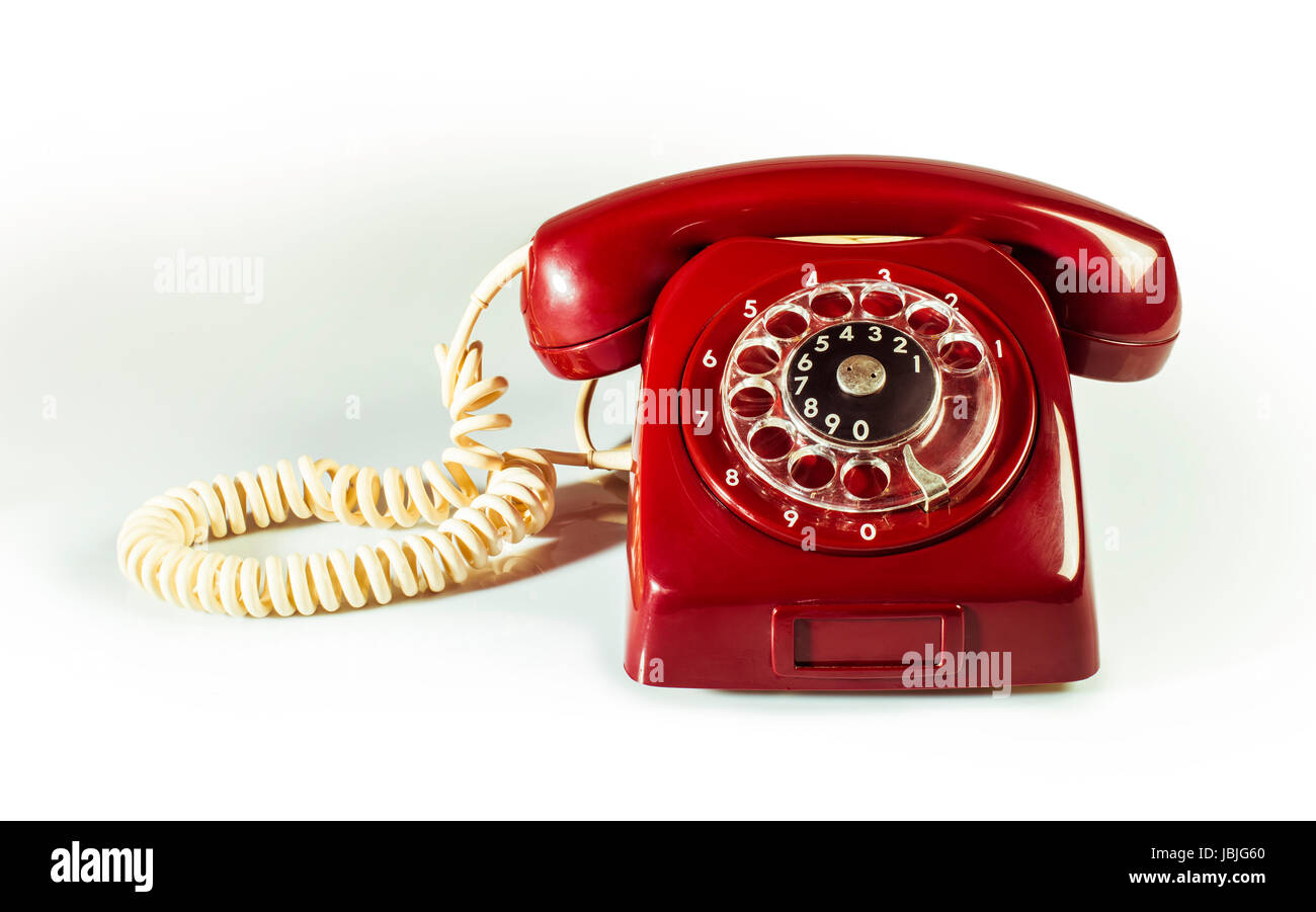 Vintage red phone on white background. White cable Stock Photo - Alamy