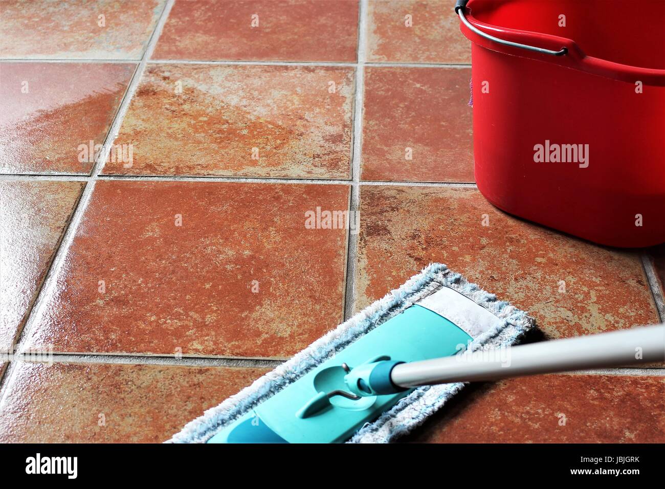 An Image of cleaning a floor Stock Photo - Alamy