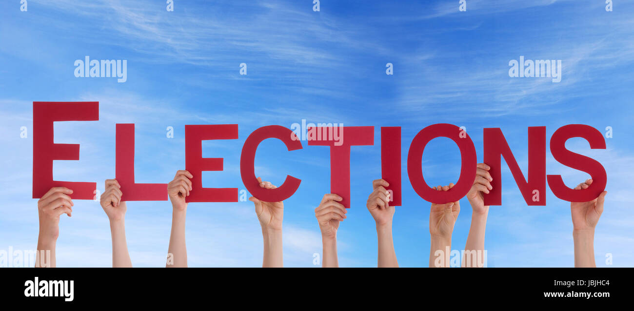 Many People Holding the Red Word Elections in the Sky Stock Photo - Alamy