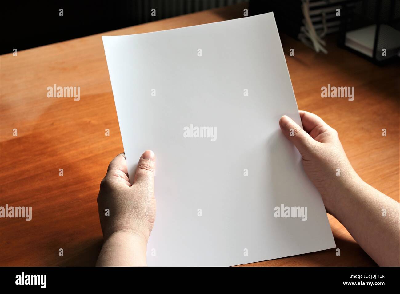 A image of a hand, or hands with paper Stock Photo - Alamy