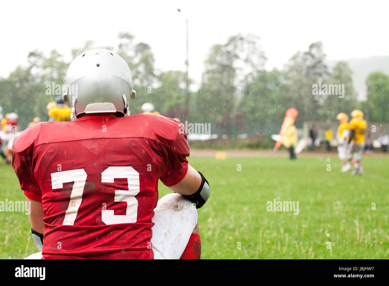 Football player on the field Stock Photo - Alamy