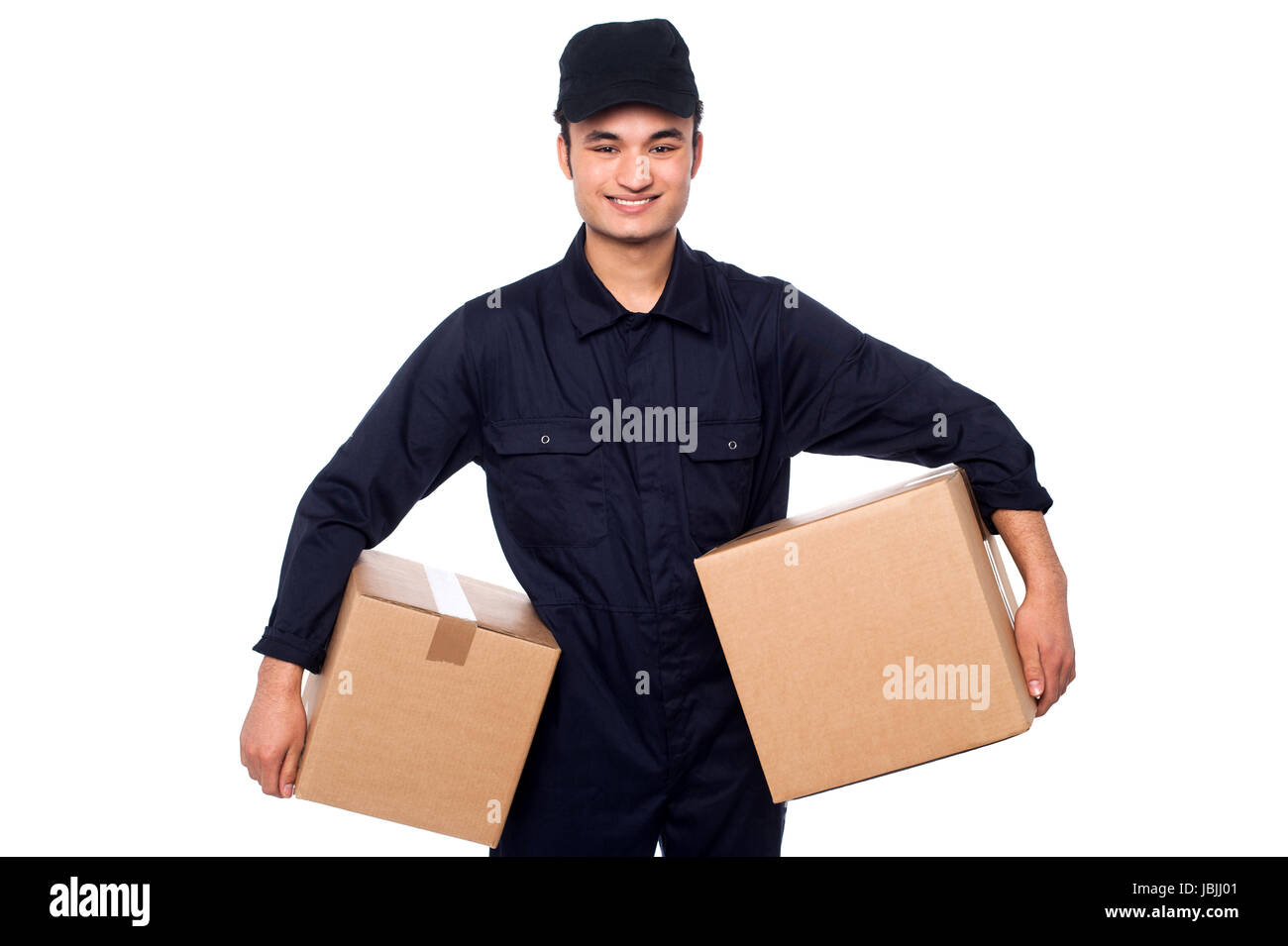 Smiling delivery man carrying two parcel boxes Stock Photo - Alamy
