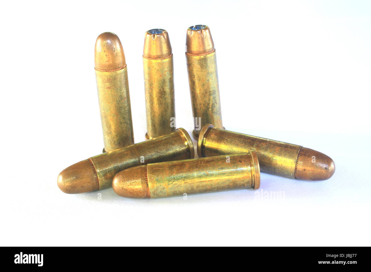bullets (ammunition) for gun isolated on a white background Stock Photo ...