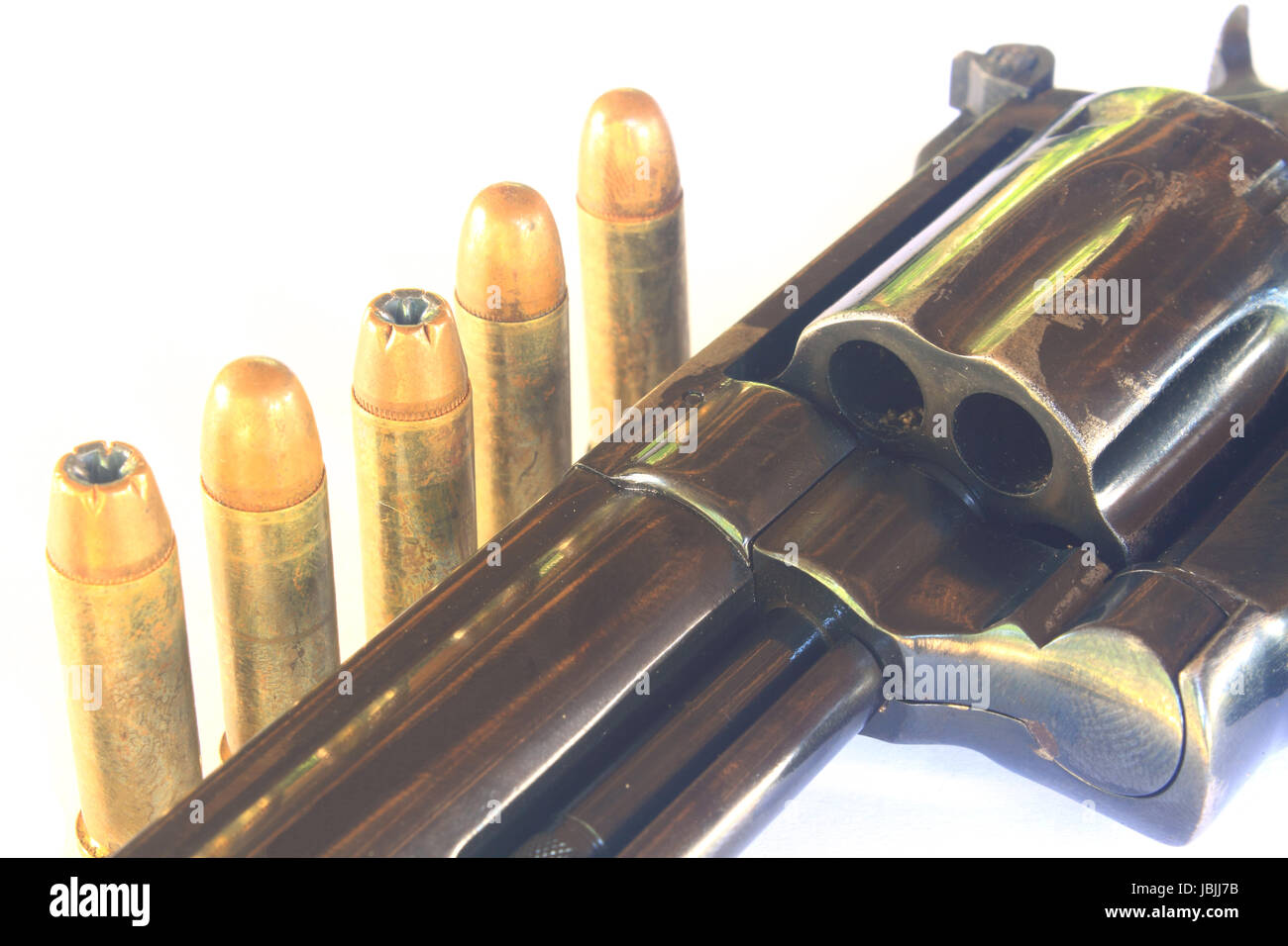 close up Gun with ammunition on white background Stock Photo - Alamy