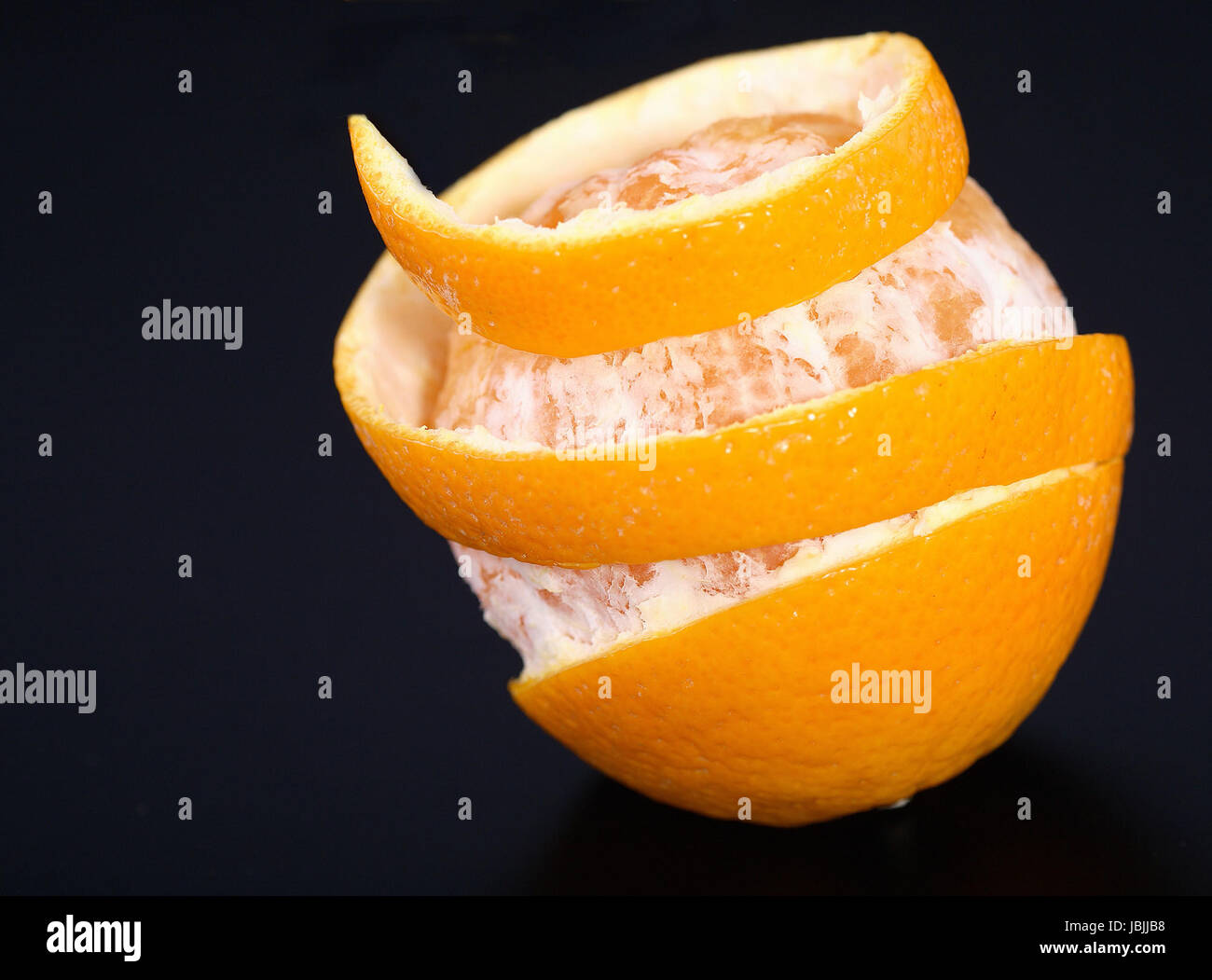 Orange pel on isolated background Stock Photo - Alamy