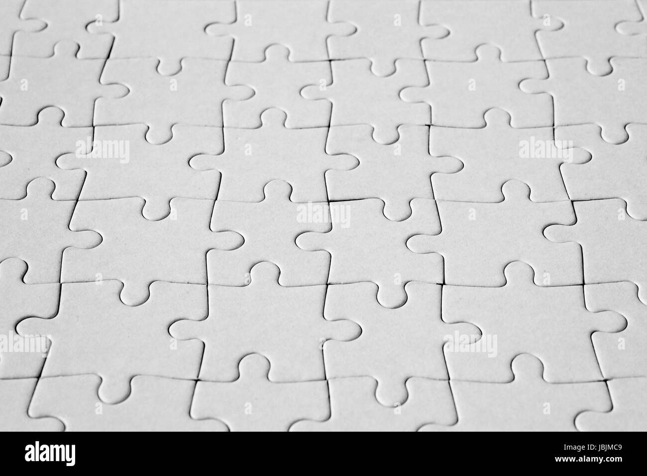 Completed puzzle of paper in low angle shot Stock Photo - Alamy