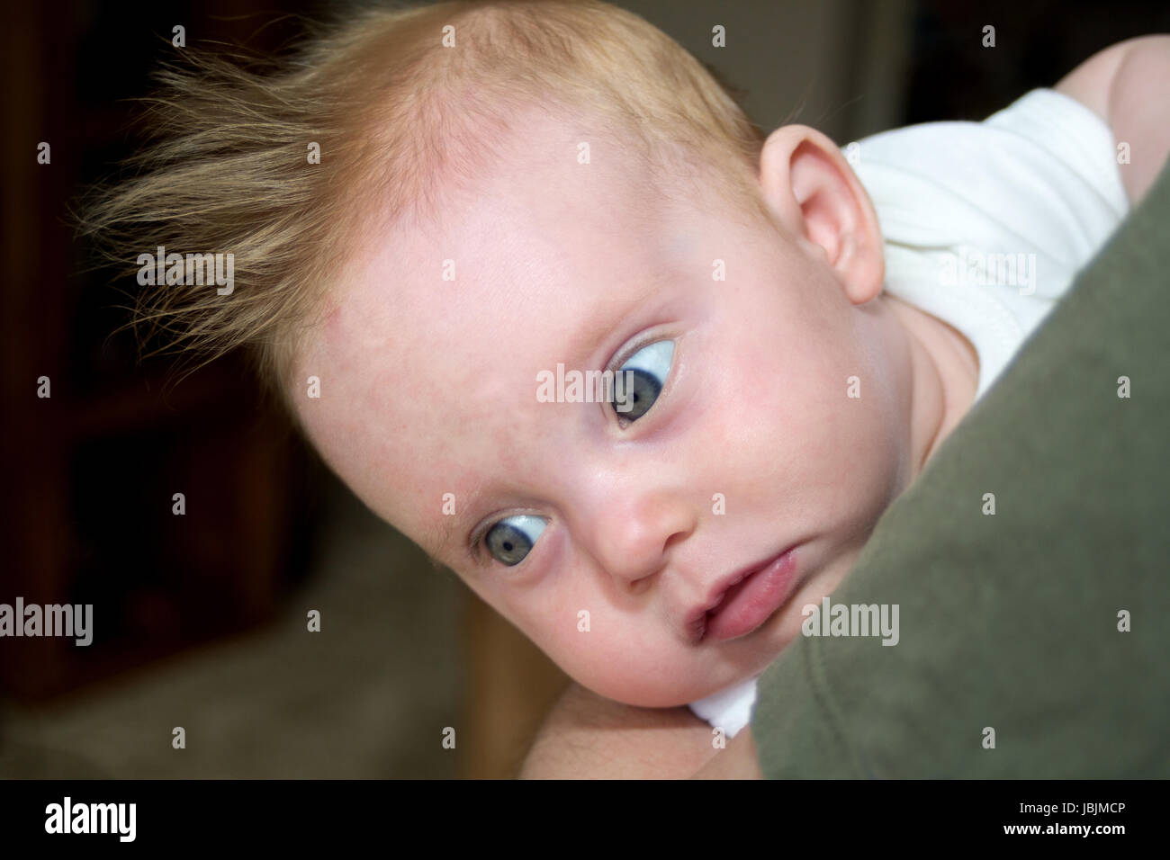An almost four month old baby is looking interested Stock Photo - Alamy
