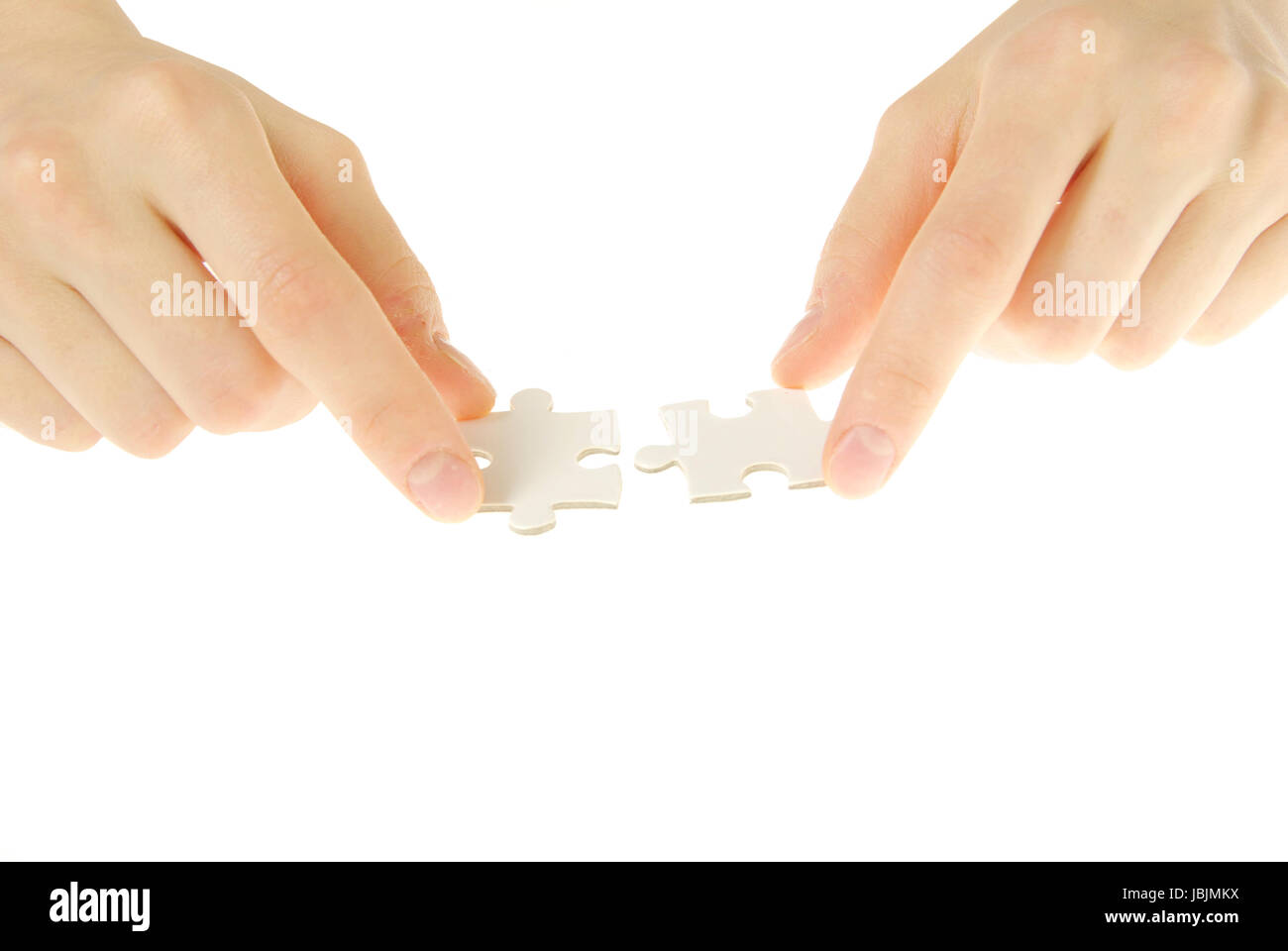 puzzle in hands isolated on white background Stock Photo - Alamy