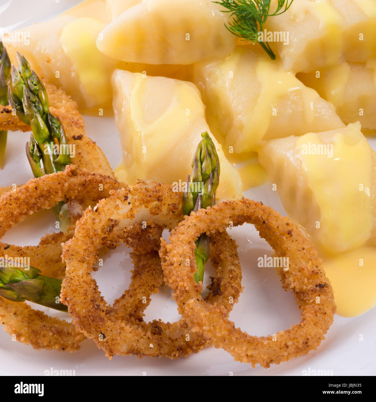 Onion ring white potato dumpling Stock Photo - Alamy