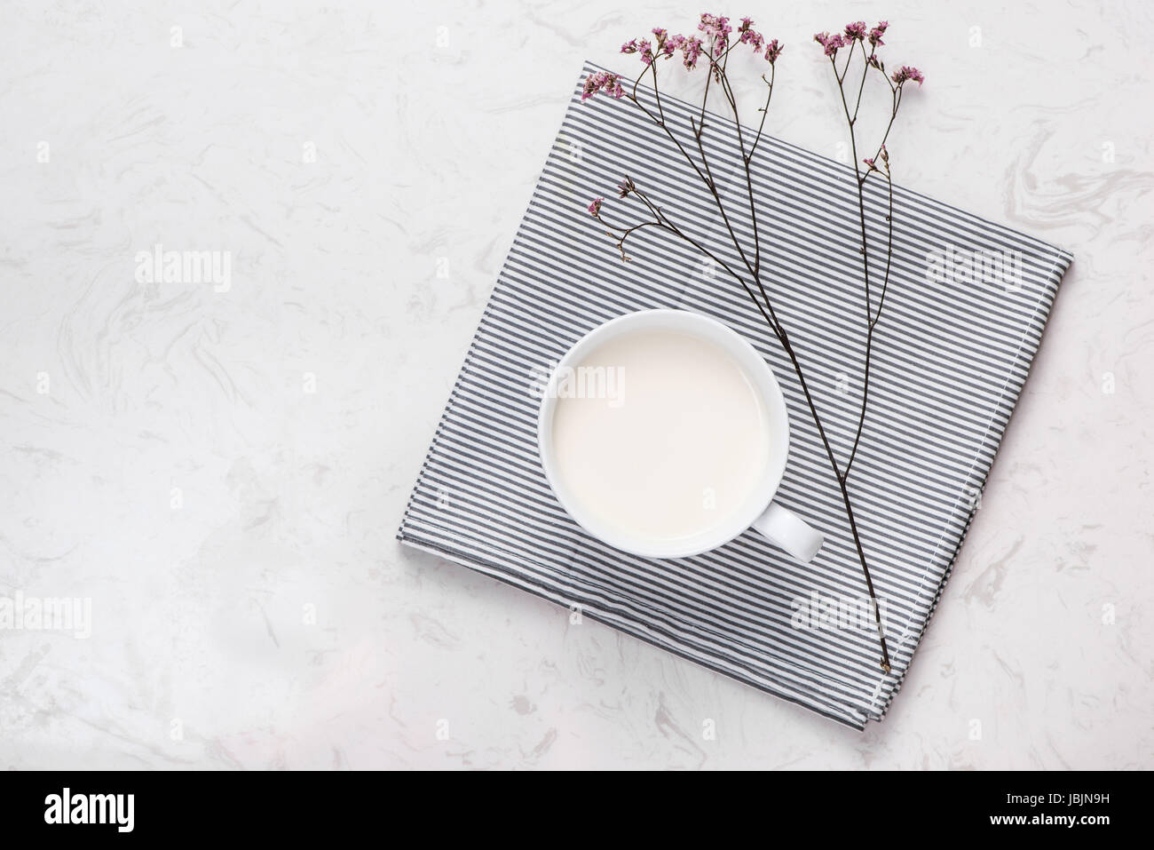 Dairy products. Top view of a cup of milk on a table Stock Photo - Alamy