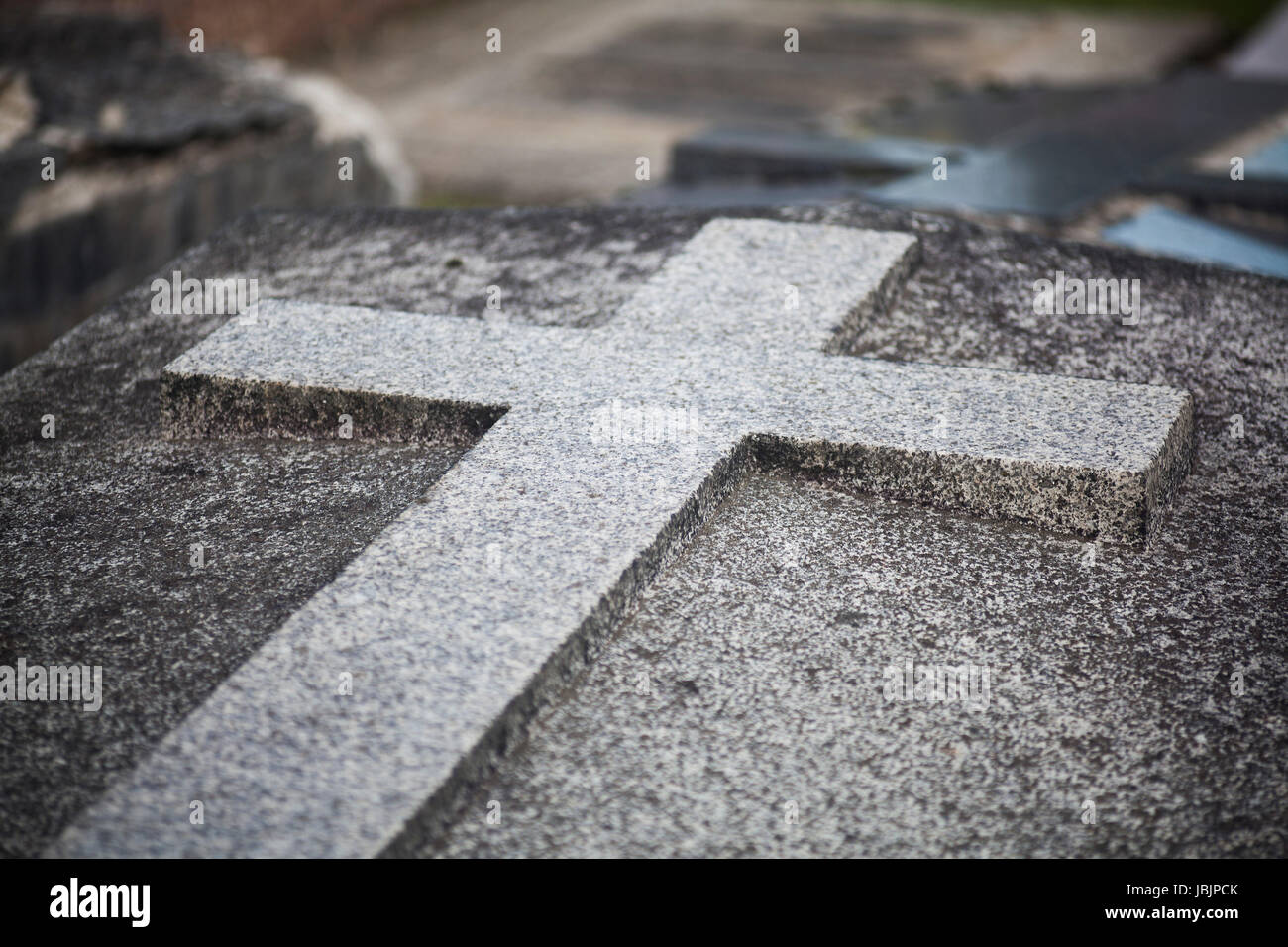 Cross in the cemetery Stock Photo - Alamy