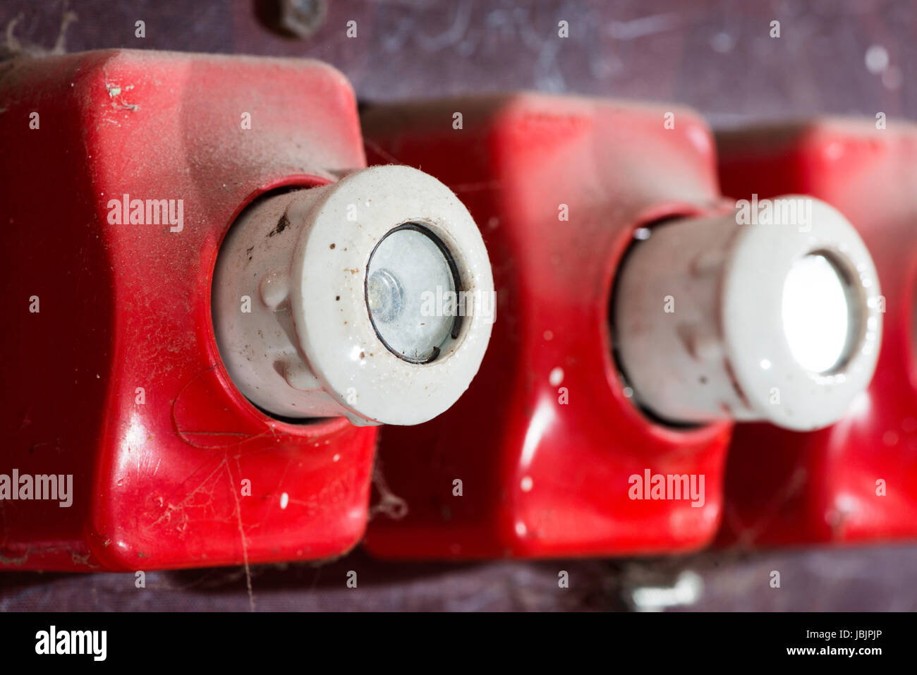 Red vintage electrical fuse. Switchboard Stock Photo - Alamy