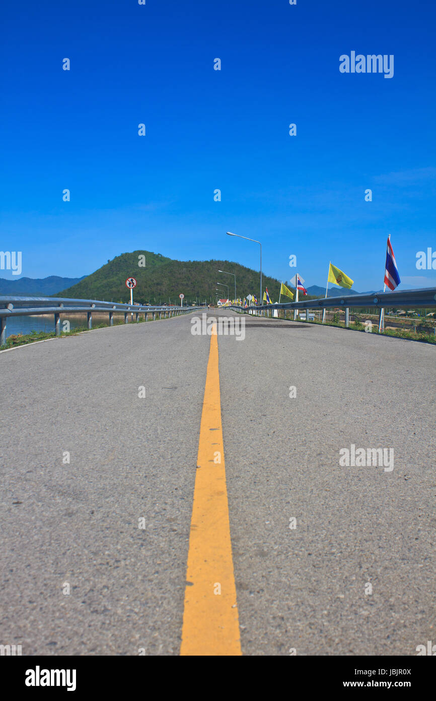 asphalt road and blue sky on top of DAM Stock Photo - Alamy