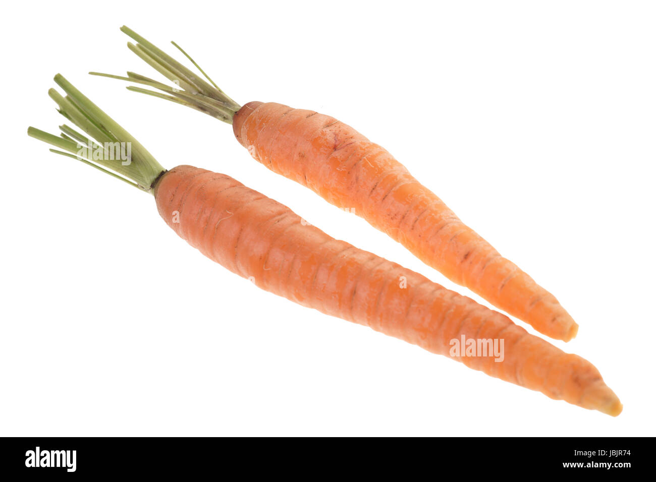 two carrots isolated over a white background Stock Photo - Alamy