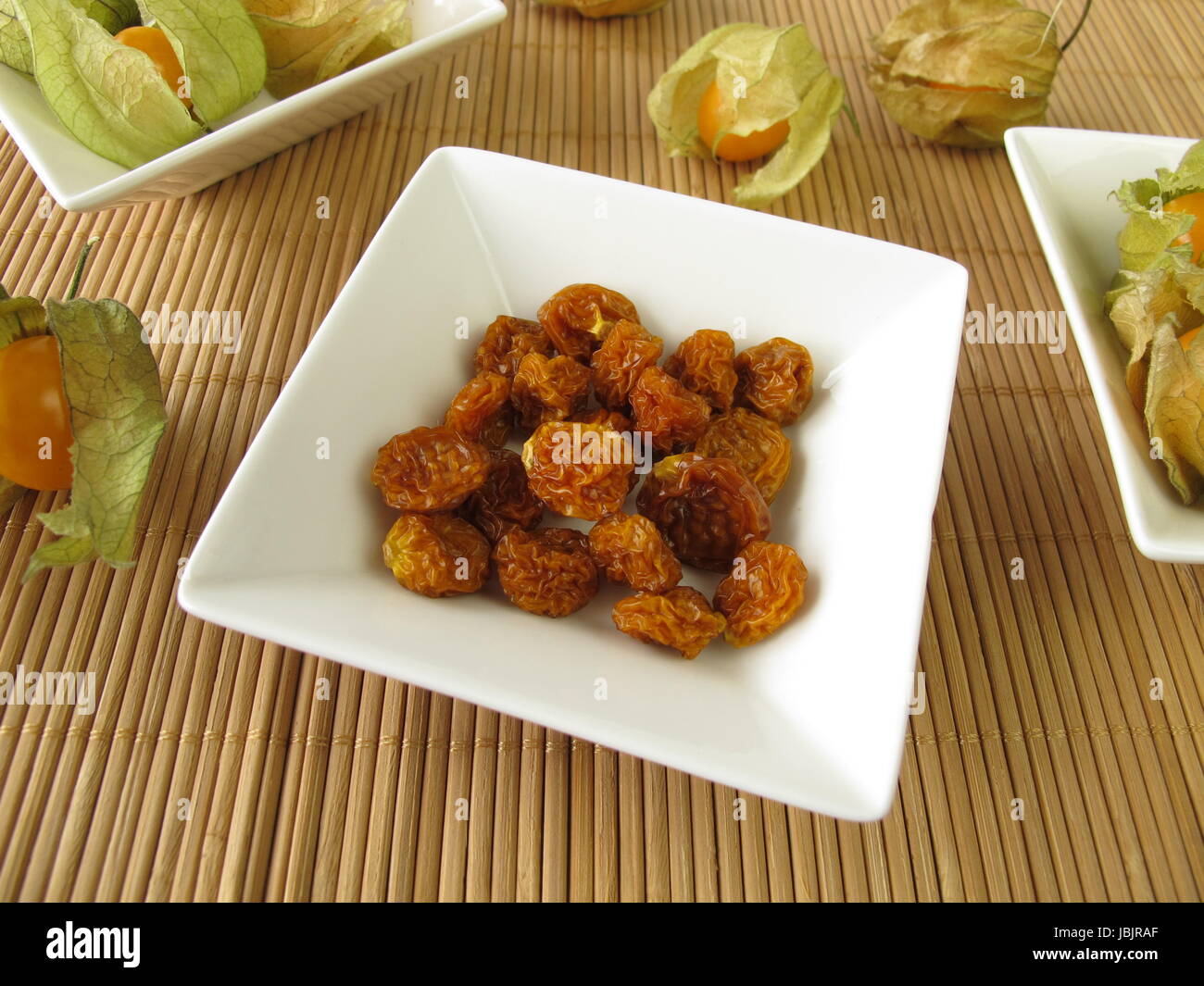 fresh and dried physalis Stock Photo - Alamy
