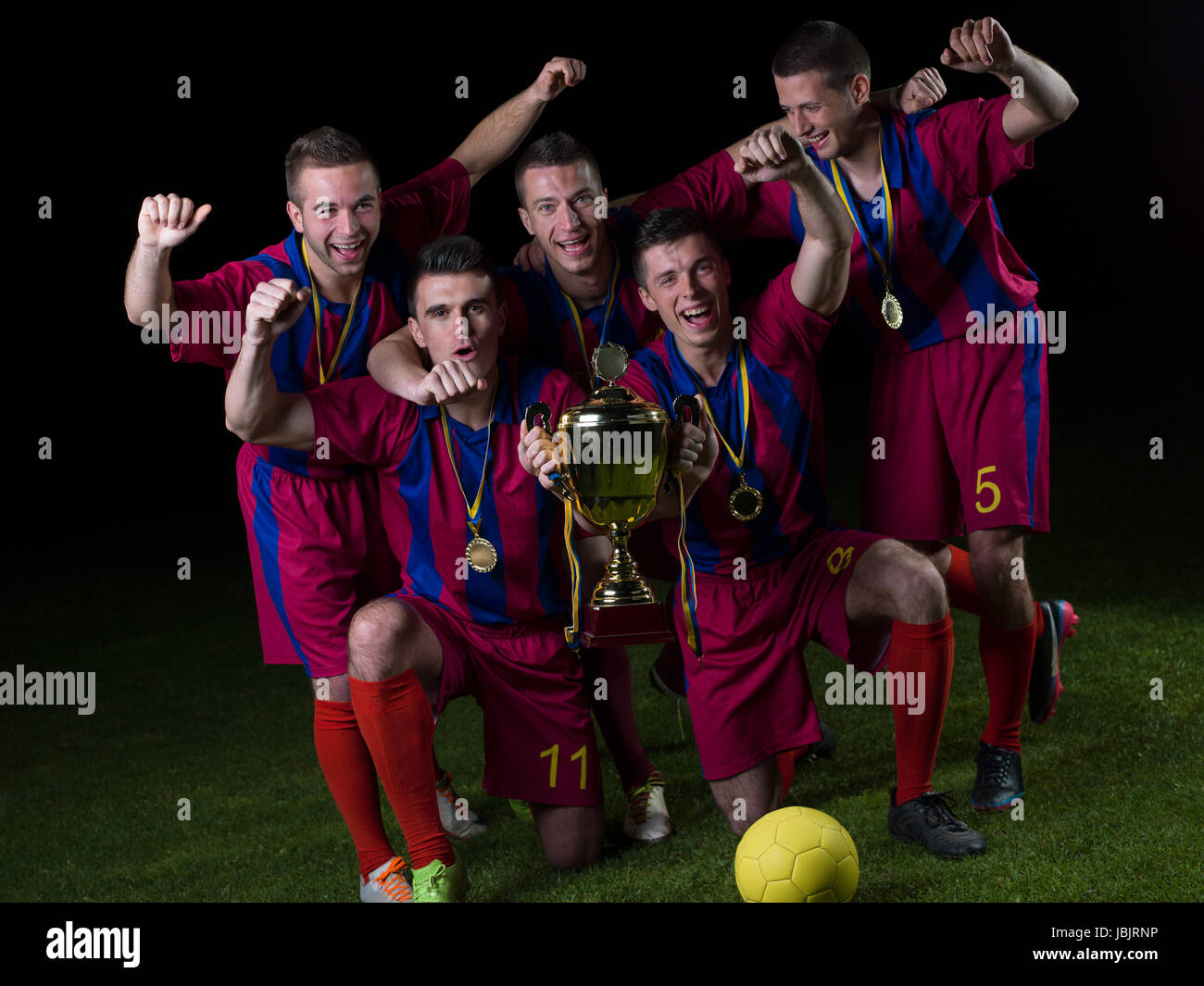soccer players team group celebrating the victory and become champion ...