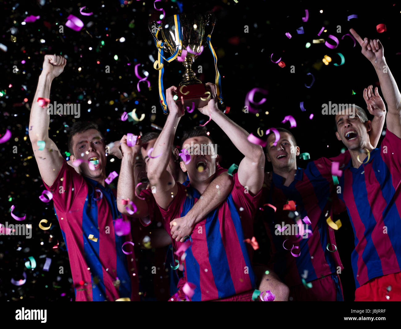 soccer players team group celebrating the victory and become champion ...