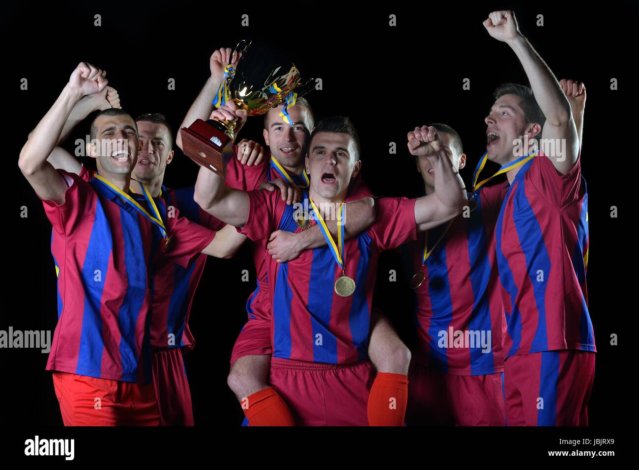 soccer players team group celebrating the victory and become champion ...