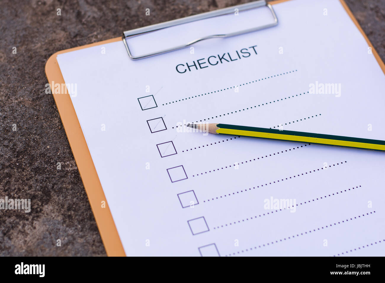 Checklist concept - checklist, paper and a pen with checklist word on ...