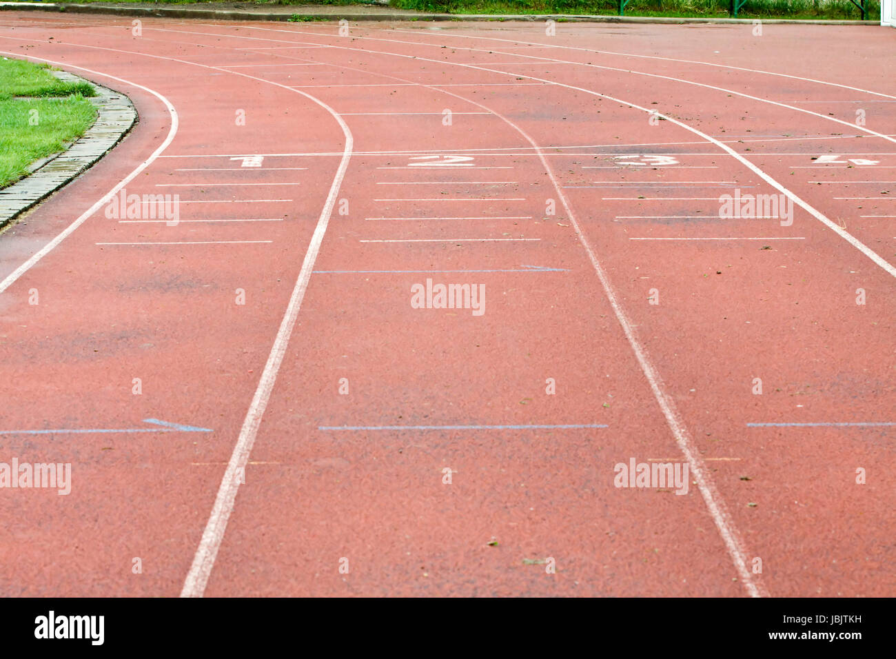 Wet Running track Stock Photo - Alamy