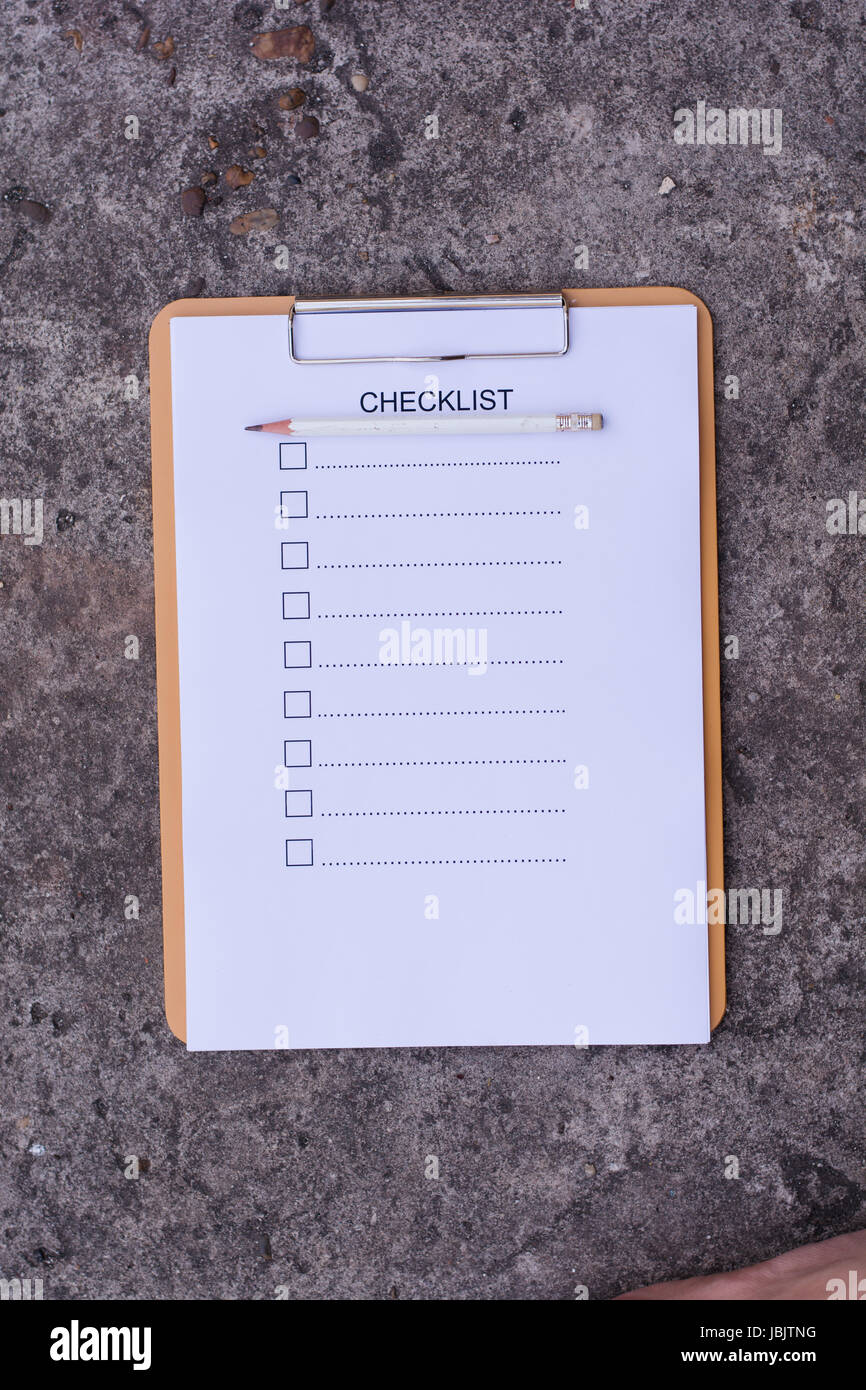 Checklist concept - checklist, paper and a pen with checklist word on ...