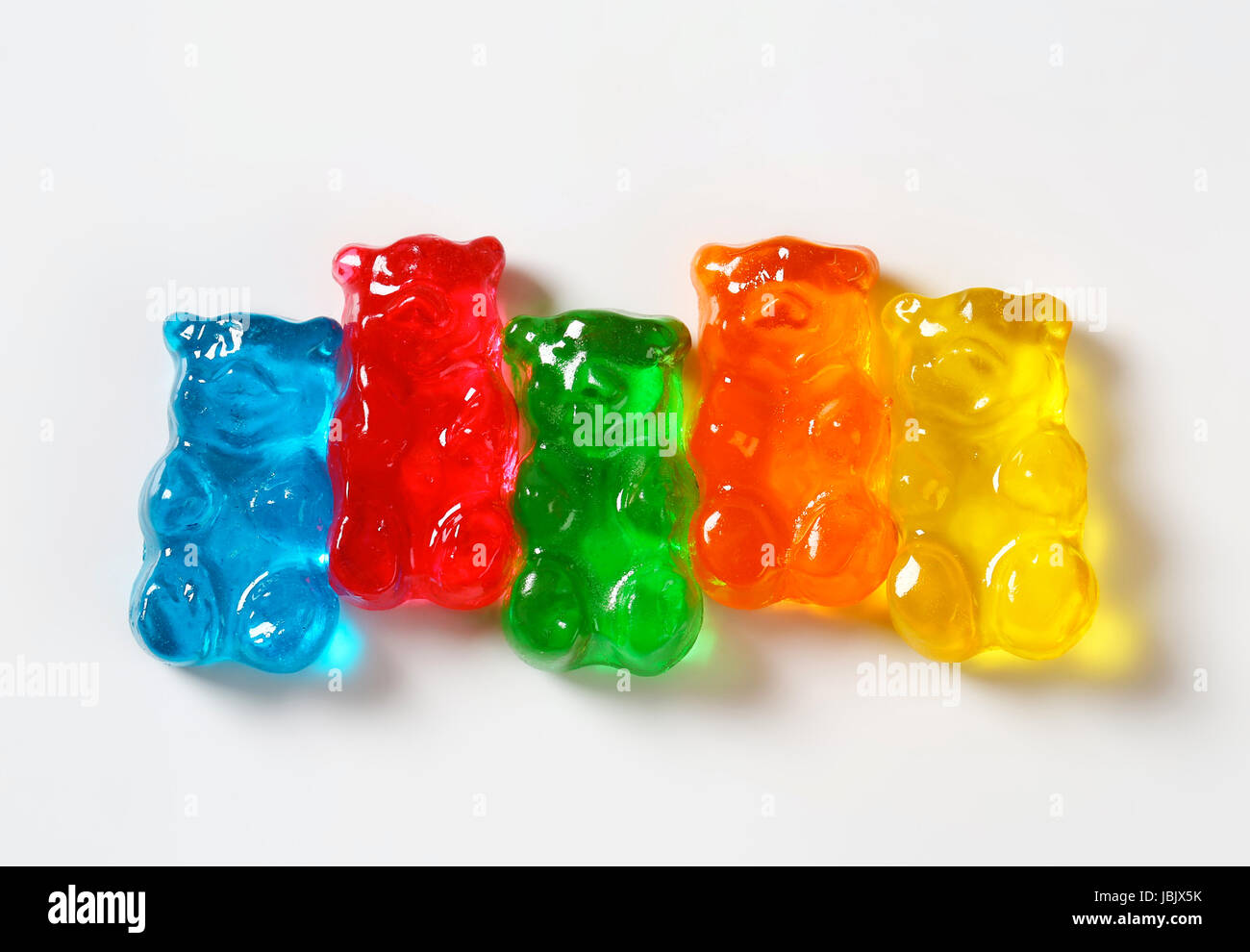 Fruit flavored gummy bears in assorted colors Stock Photo - Alamy
