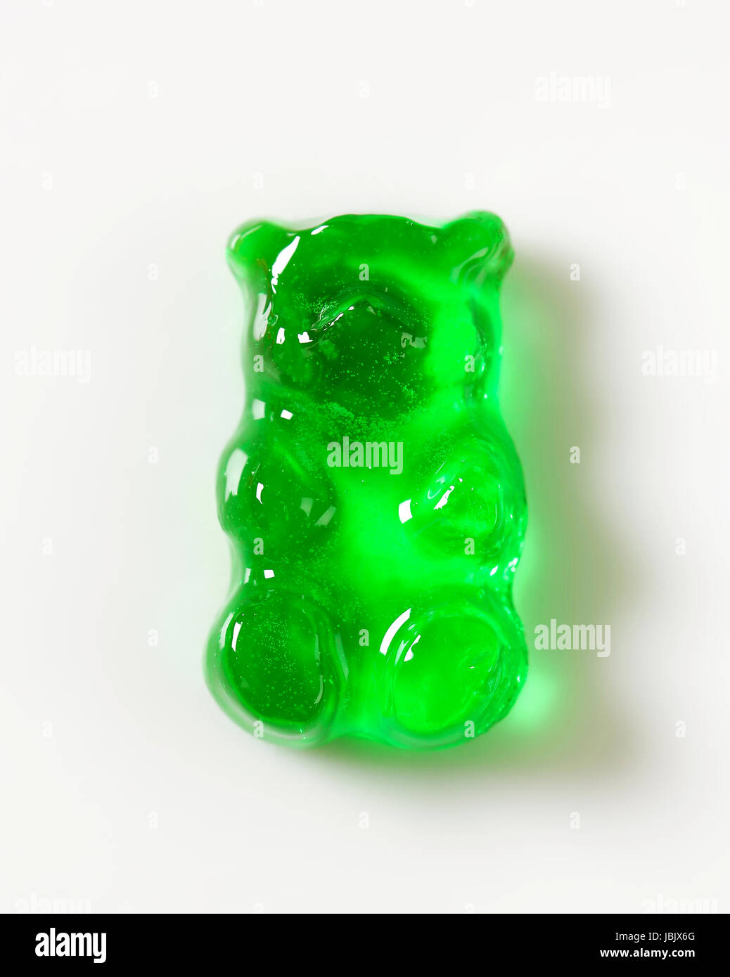 Green apple gummy bear candy Stock Photo - Alamy