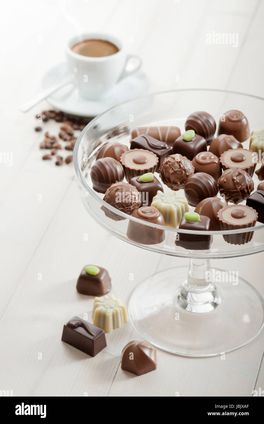 assorted chocolates confectionery on tray with cup of coffee Stock ...