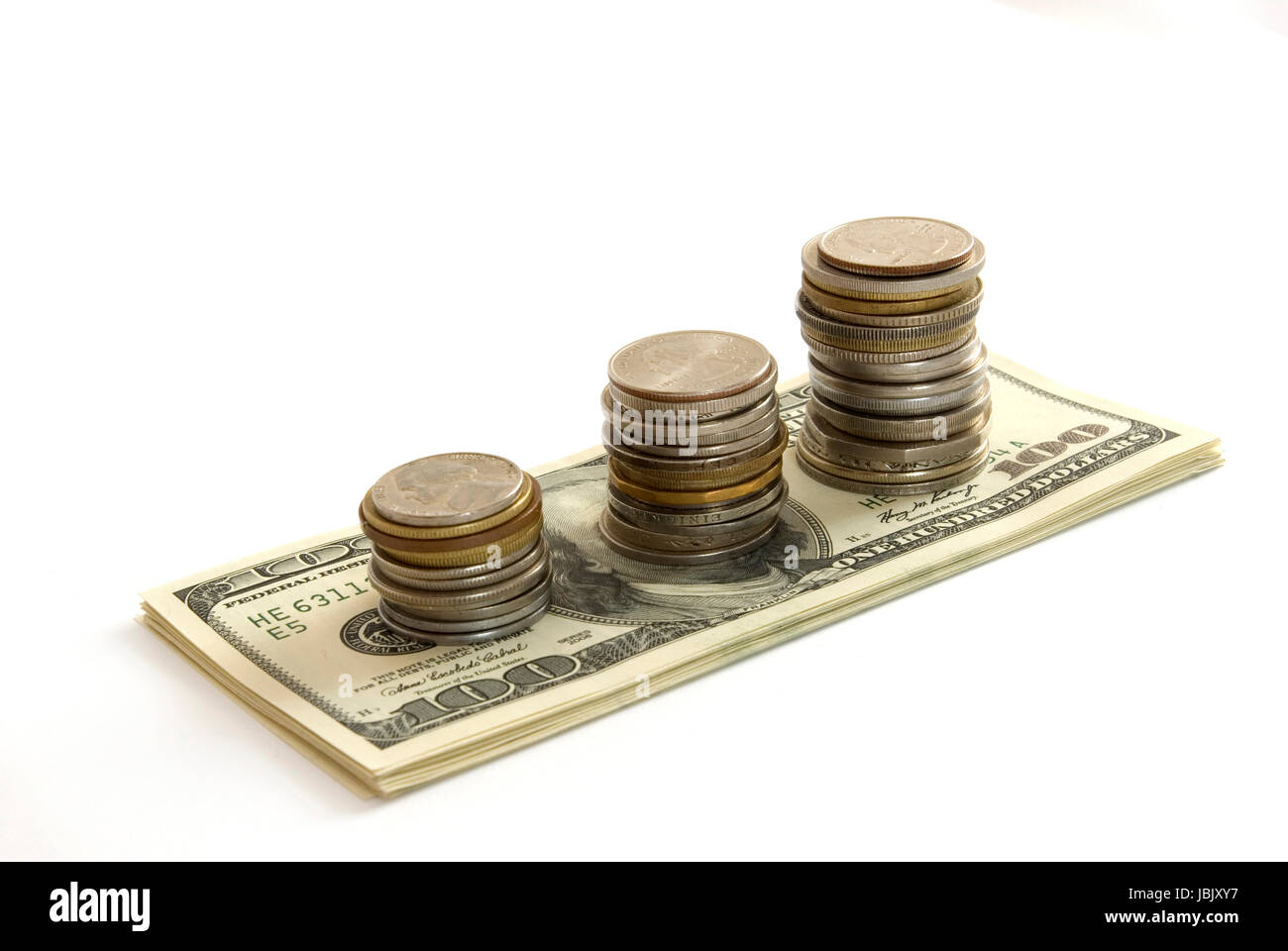 Dollars and coins isolated on white background Stock Photo - Alamy