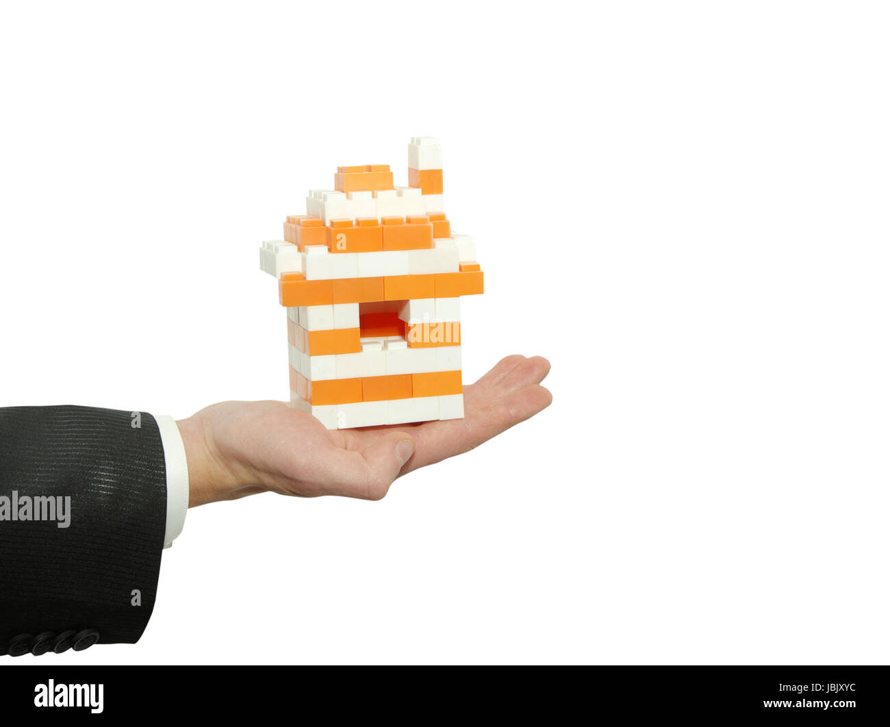 hand holding house isolated on white Stock Photo - Alamy